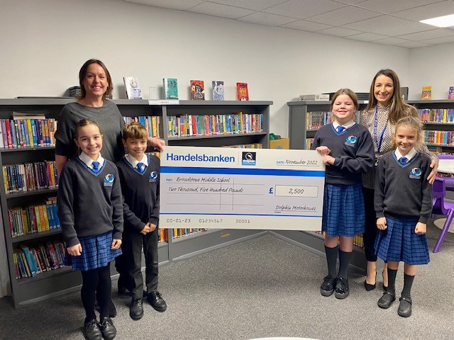 Dolphin donates £2500 to Broadstone Middle School! - Dolphin Motorhomes